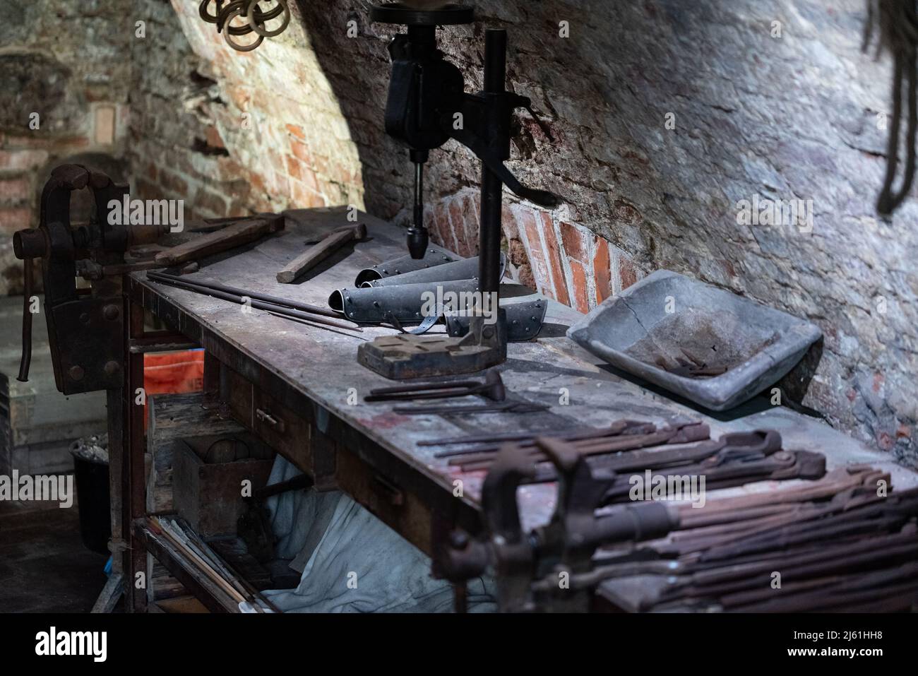 Old blacksmith's workshop, museum in Masovia. Hammers, horseshoes and ...