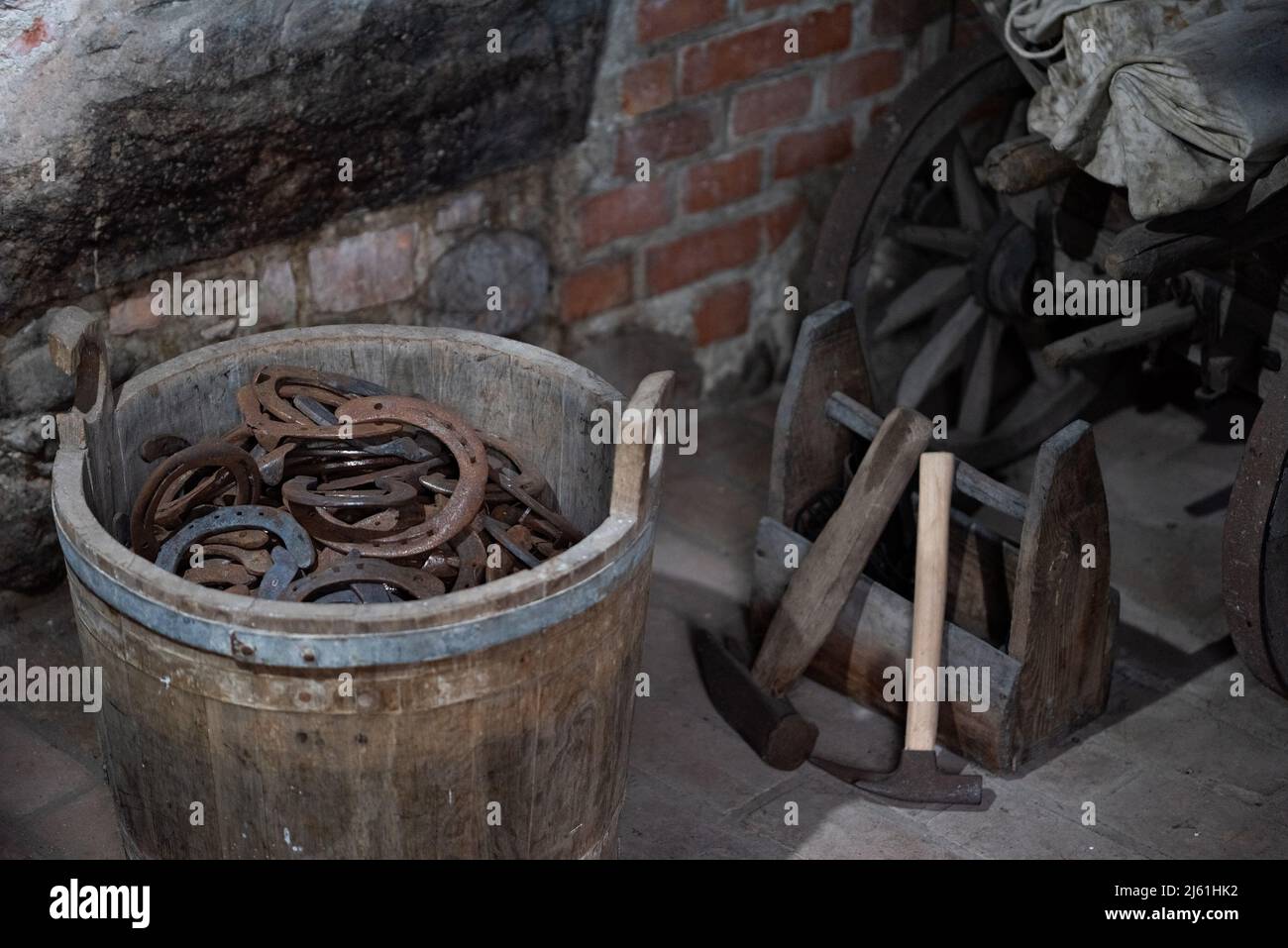 Old blacksmith's workshop, museum in Masovia. Hammers, horseshoes and ...