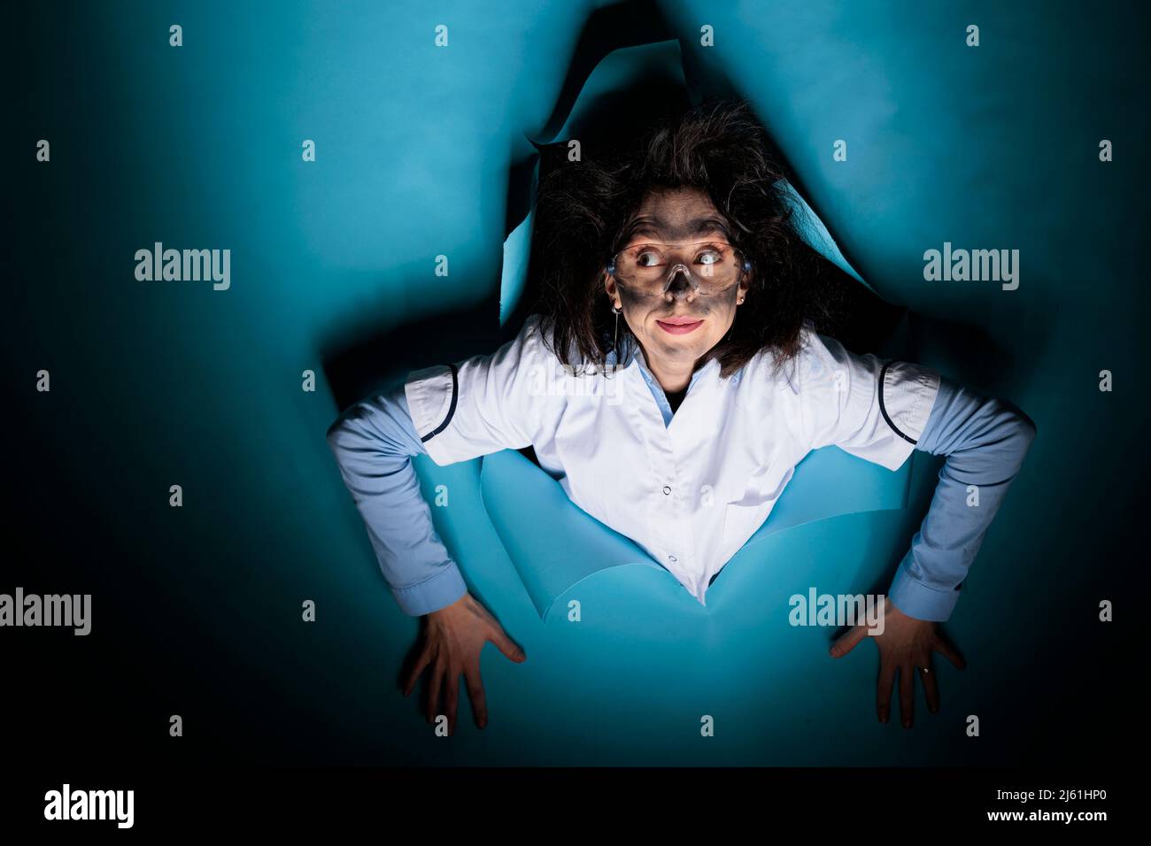 Crazy biochemistry expert with goofy face expression and wacky look ...