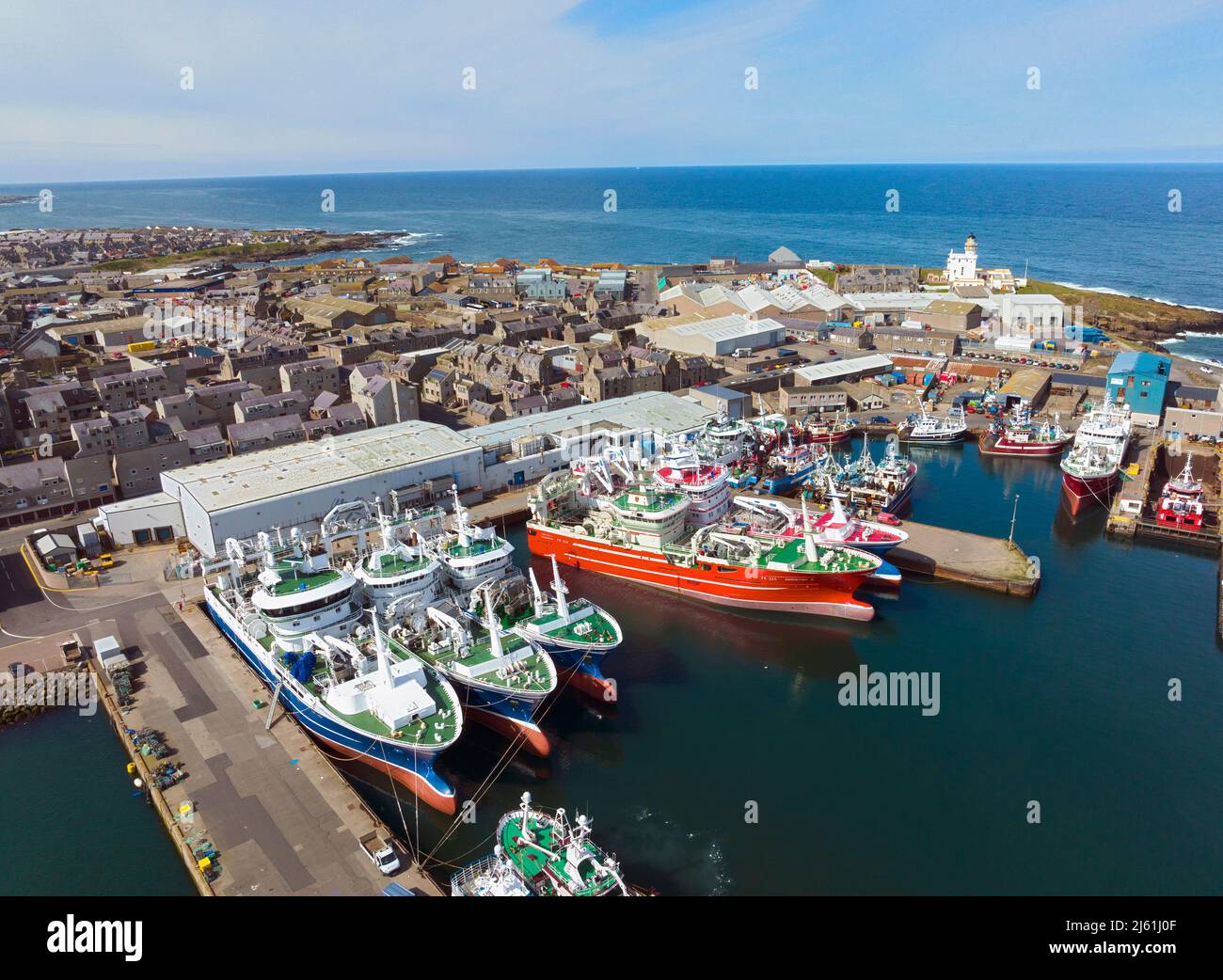 Aerial view of trawlers in fishing port and harbour at Fraserburgh in ...