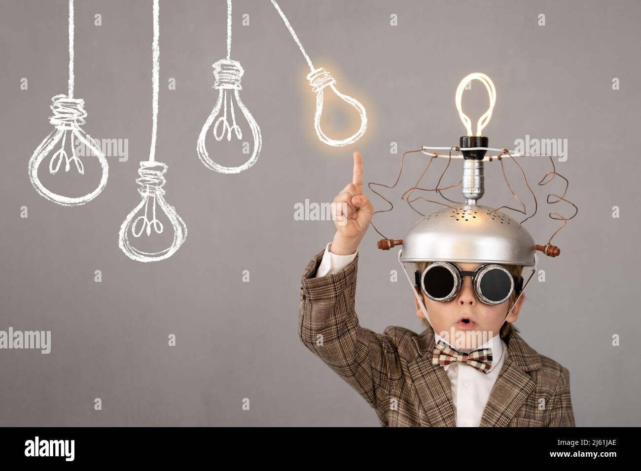 Smart child pretend to be businessman. Funny kid wearing helmet with ...