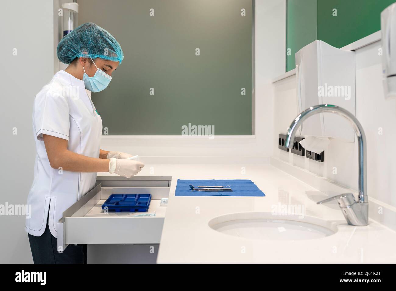 Nurse preparing surgical instruments in operating room at hospital ...