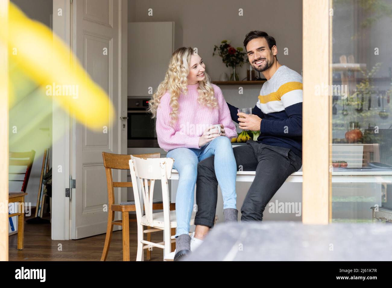 Couple sitting table together hi-res stock photography and images - Alamy