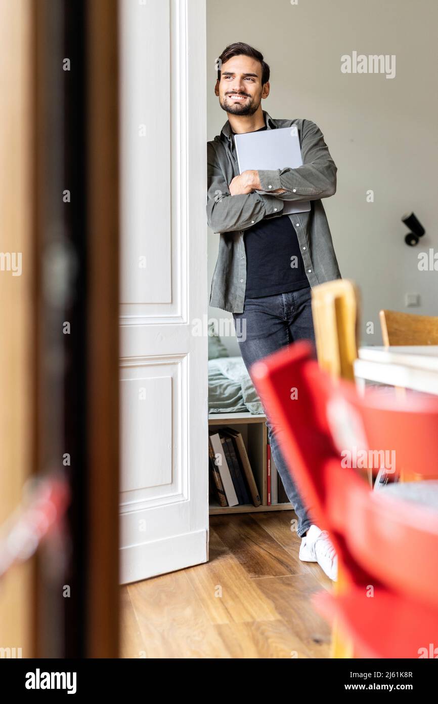 Man leaning on front door hi-res stock photography and images - Alamy