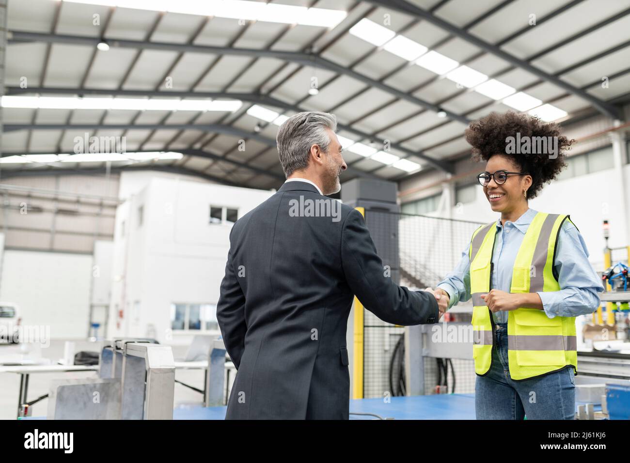 Women in business meeting shaking hand hi-res stock photography and images - Alamy