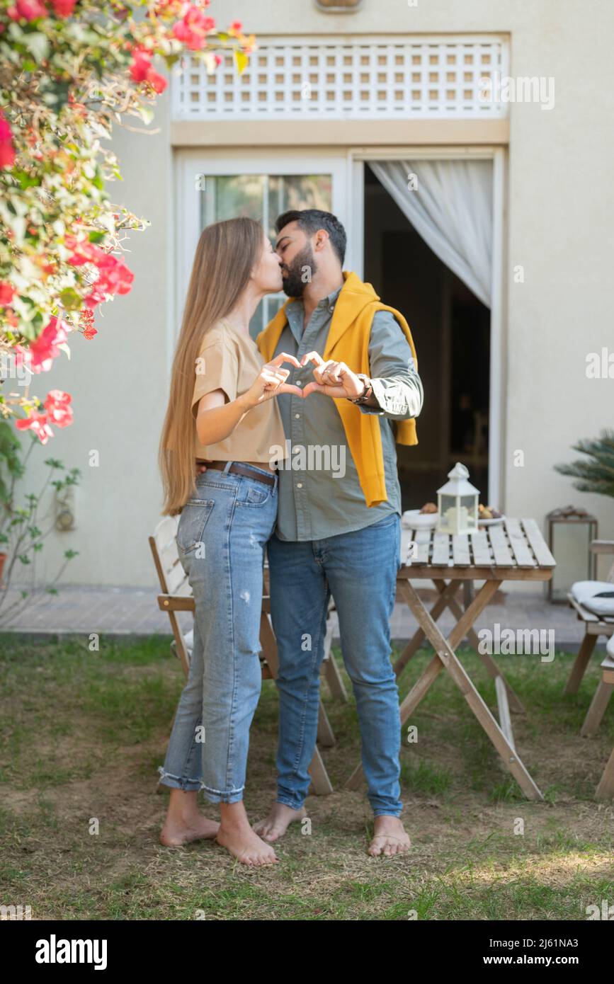 Man showing love sign hands hi-res stock photography and images - Alamy