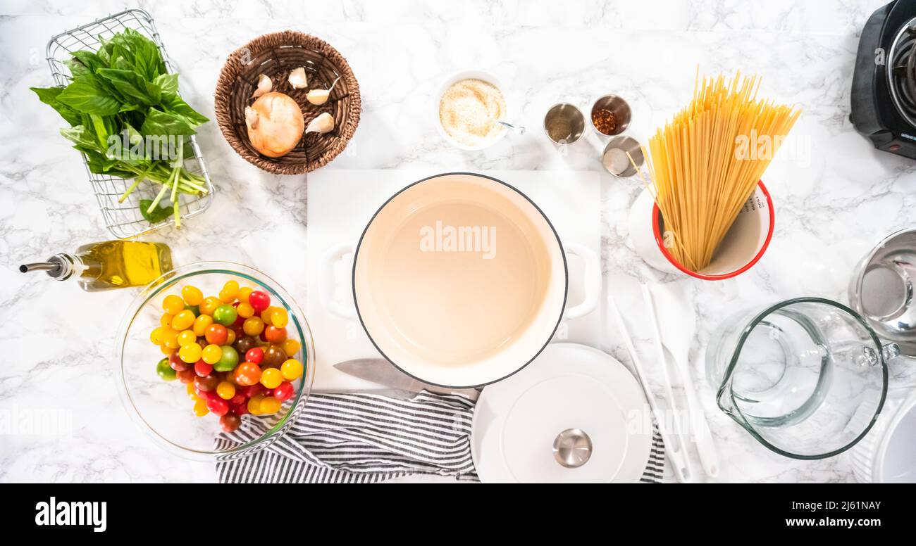 Flat lay. Ingredients to prepare vegetarian one pot pasta Stock Photo ...