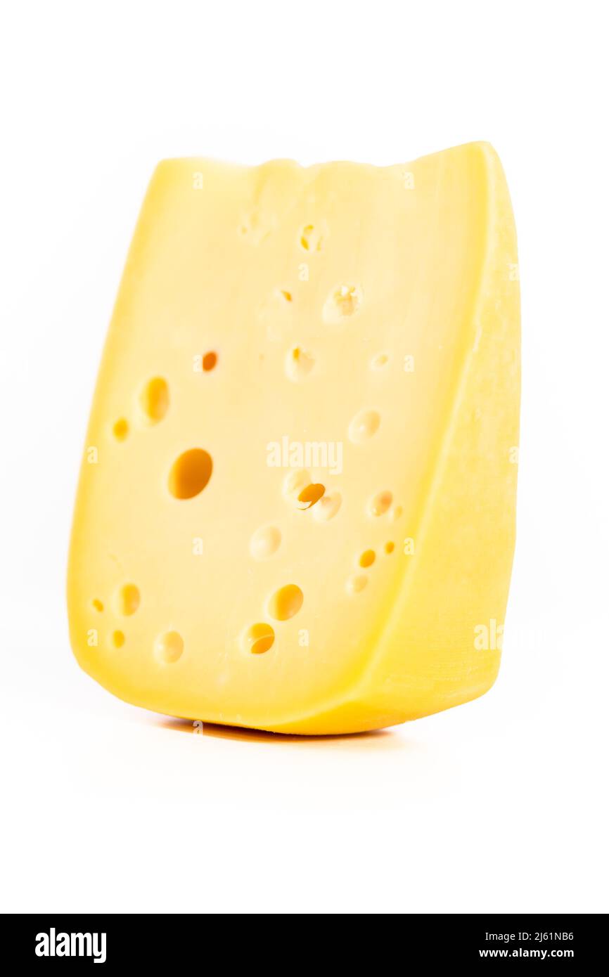 Large slice of semi soft part skim cheese on a white background Stock ...