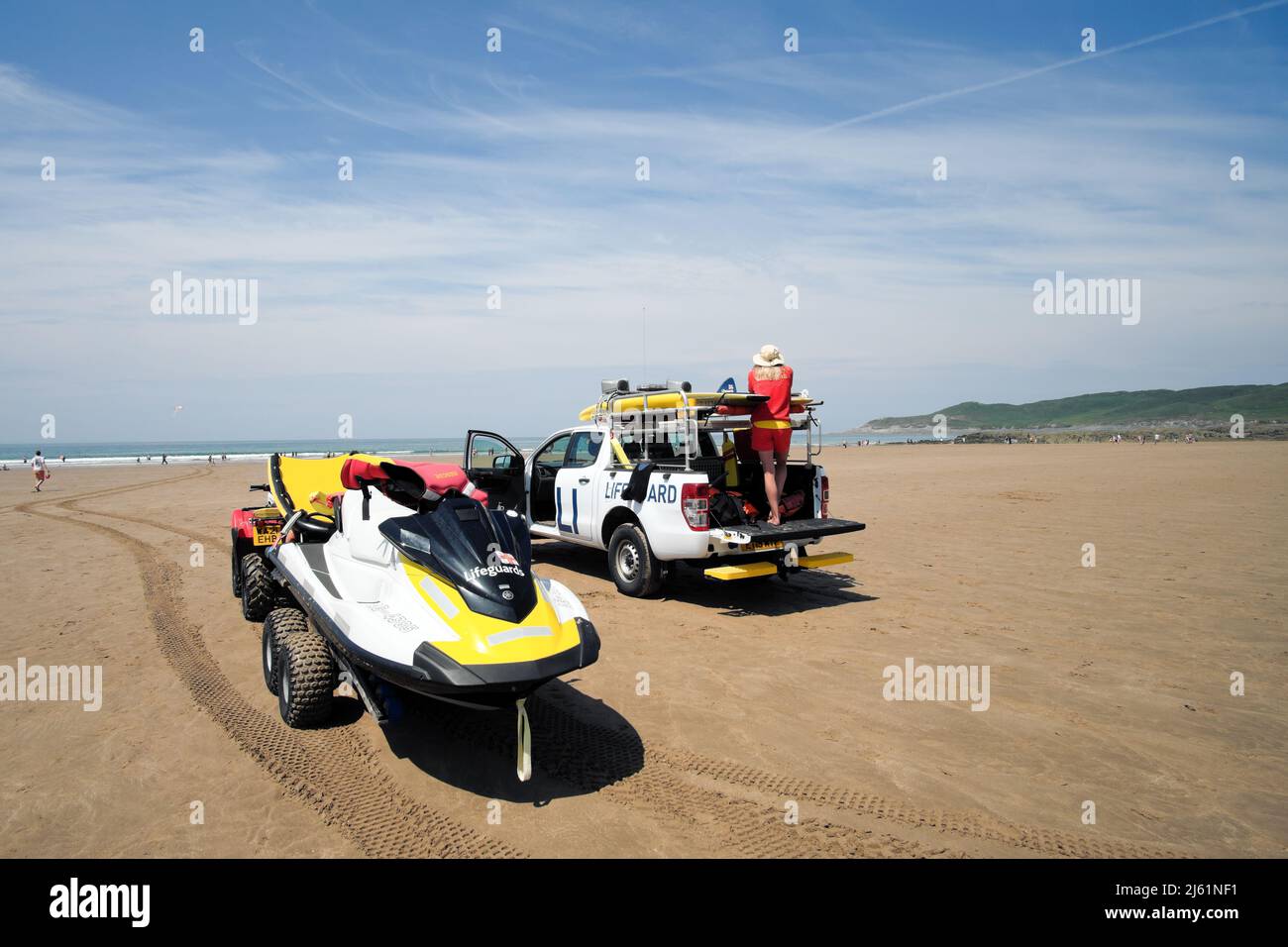 RNLI Lifeguards on Patrol on Woolacombe Beach in North Devon England UK ...