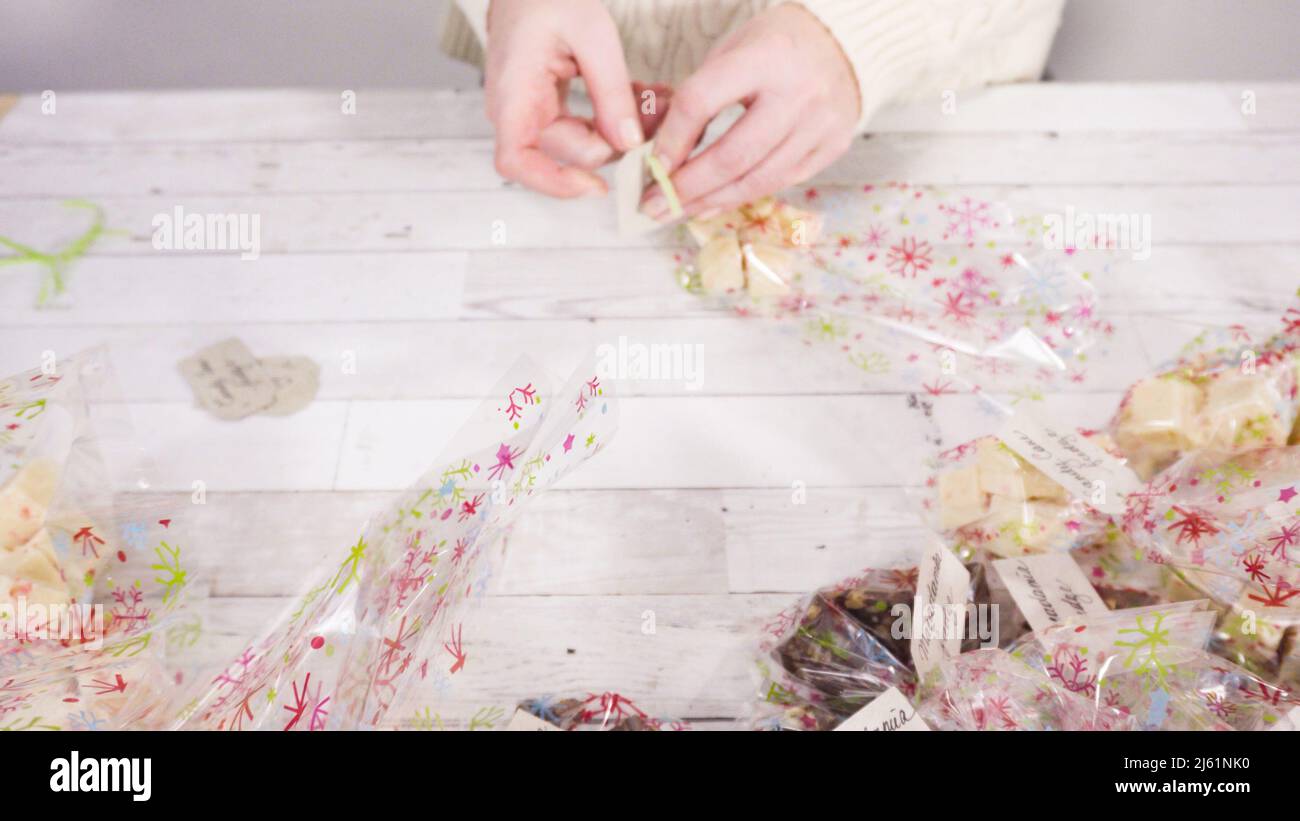 Step by step. Packaging homemade candy cane fudge into small gift bags ...