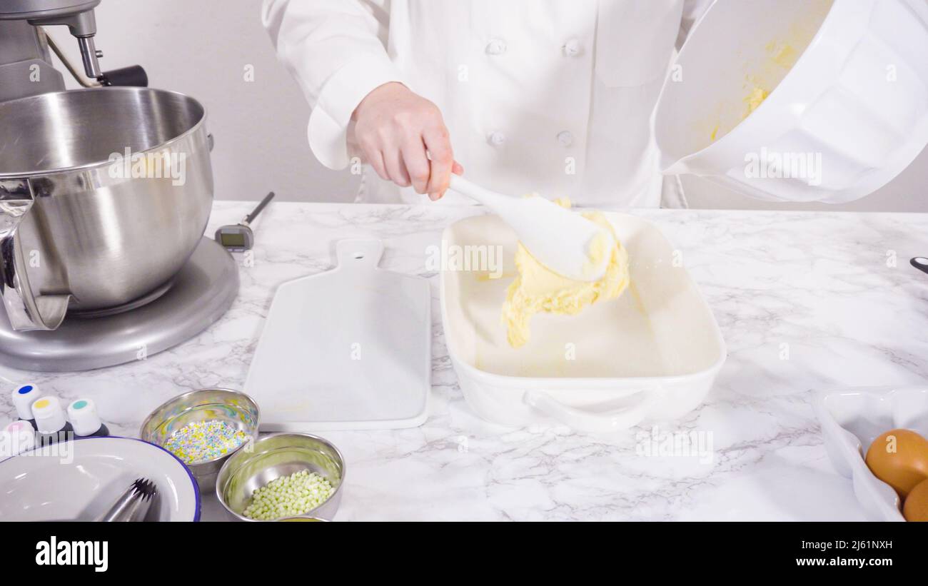 Mixing ingredients to bake sheet cake with Italian buttercream frosting ...