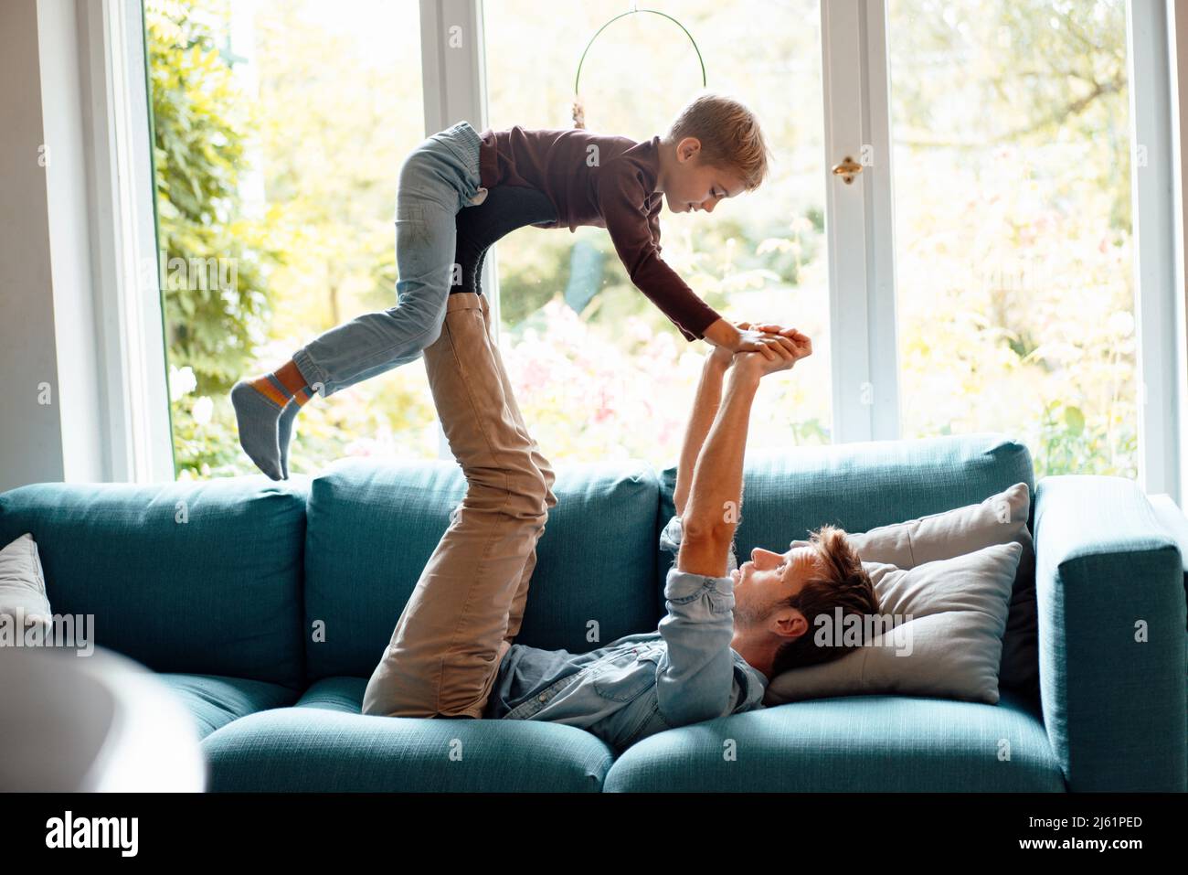 Lifting hands hi-res stock photography and images - Alamy