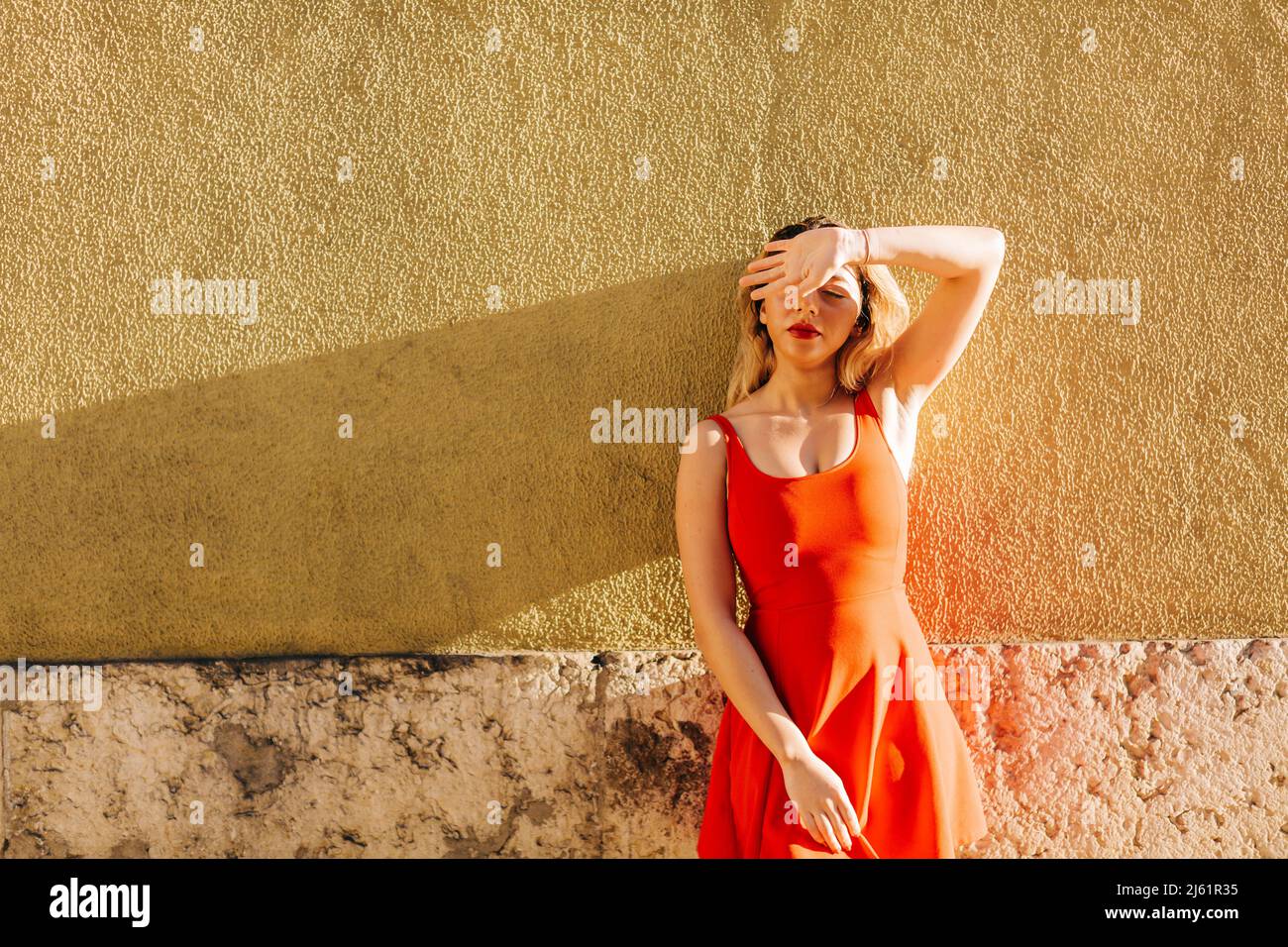 Young woman shielding eyes view hi-res stock photography and images - Alamy
