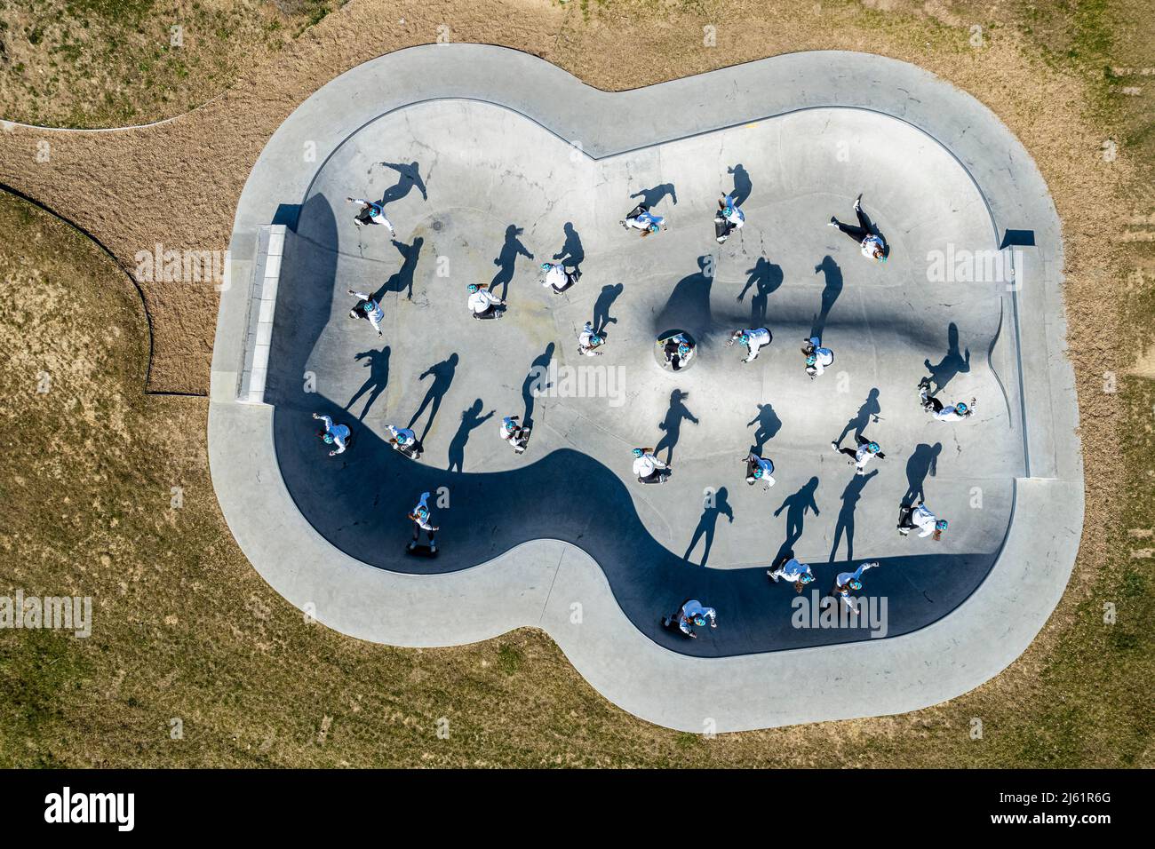 Young woman skateboarding at pump track Stock Photo - Alamy
