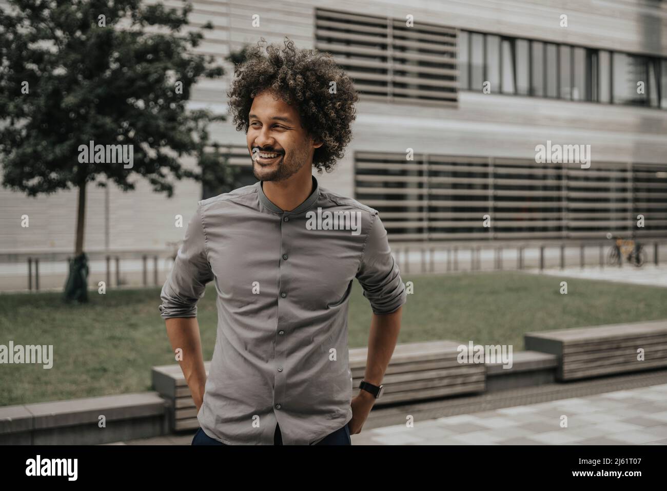 Modern young smiling man hi-res stock photography and images - Alamy