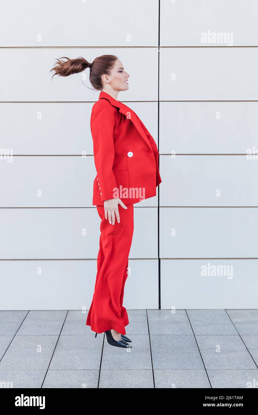 Woman ponytail side hi-res stock photography and images - Alamy