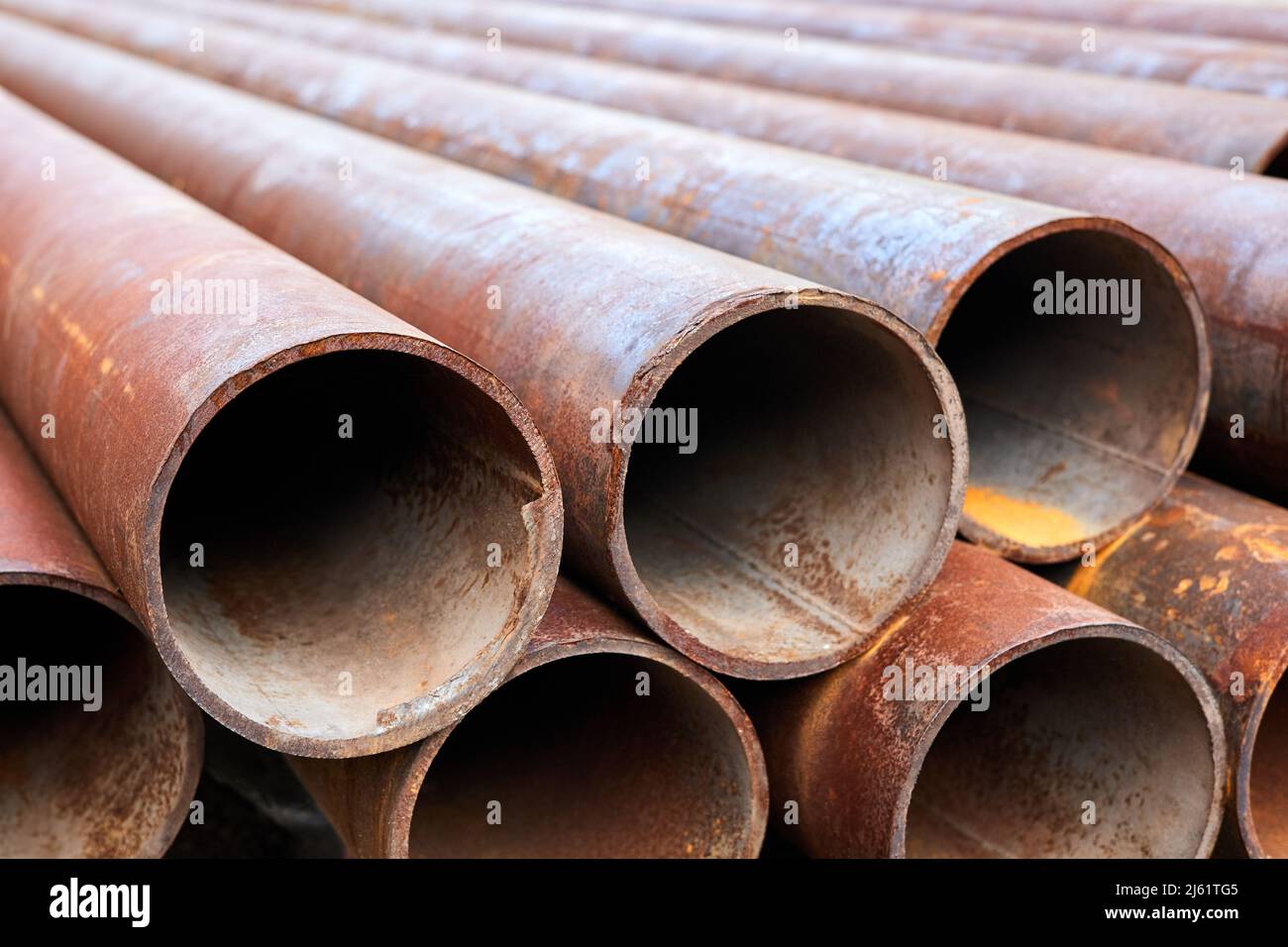 Metal rusty pipes lying in hi-res stock photography and images - Alamy