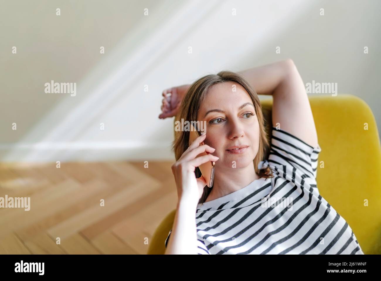 Sitting behind phone hi-res stock photography and images - Alamy