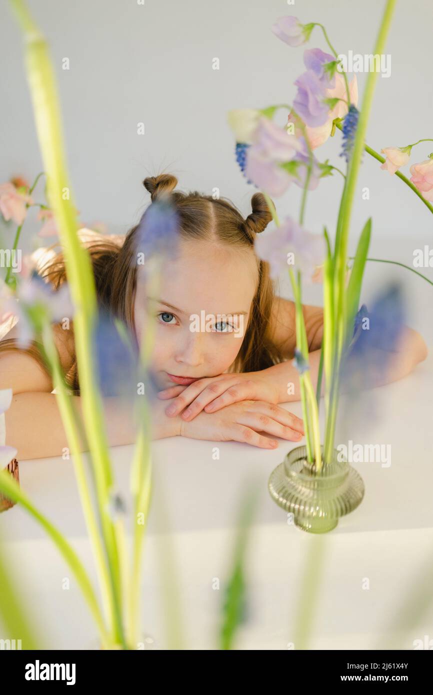 Girl leaning table hi-res stock photography and images - Alamy