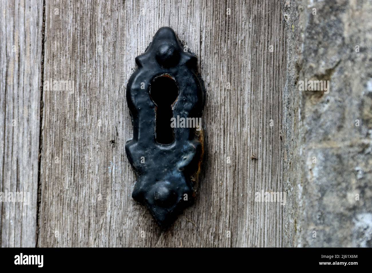 Ancient keyhole surround on an ancient timber castle door Stock Photo ...