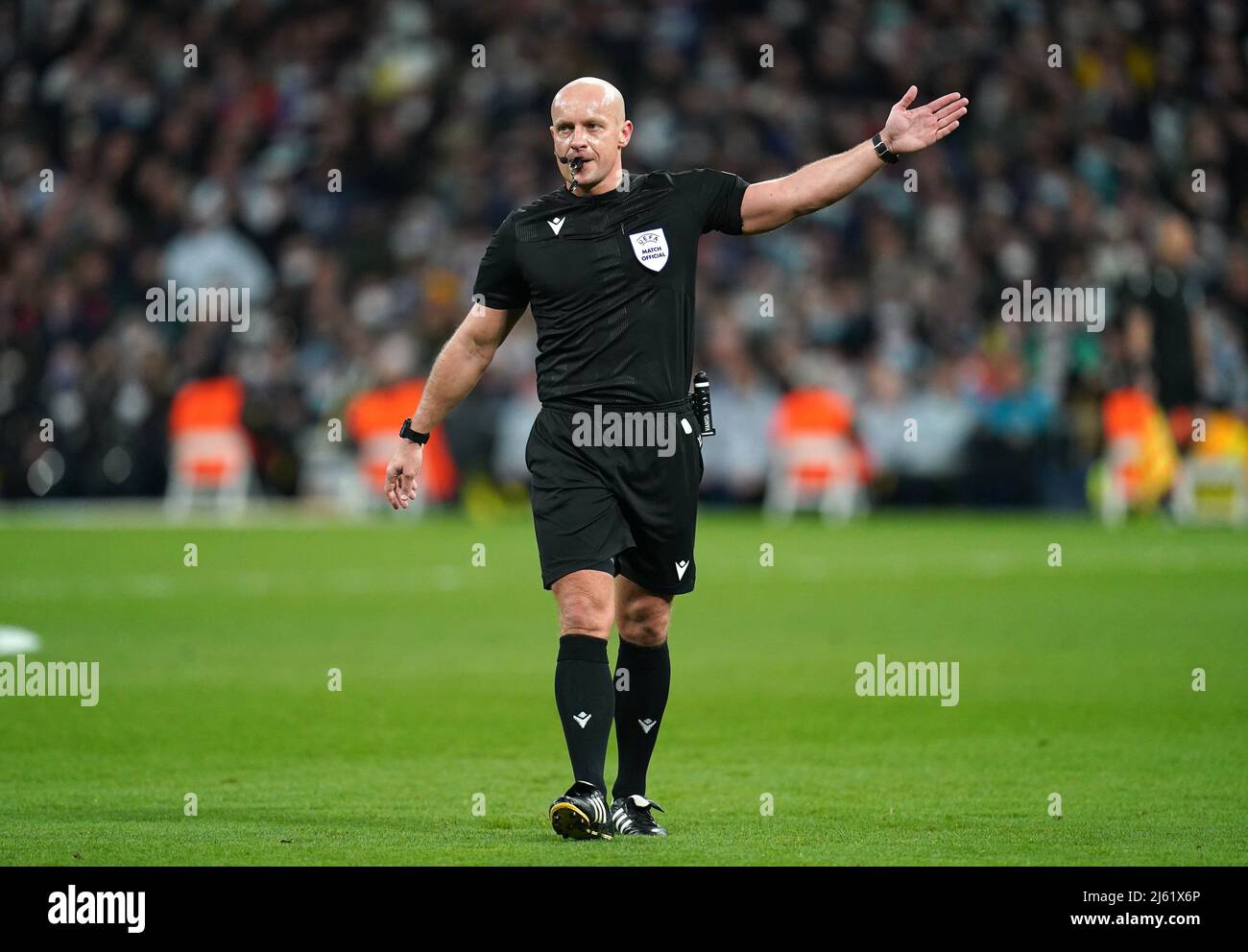 Match referee Szymon Marciniak during the UEFA Champions League quarter ...