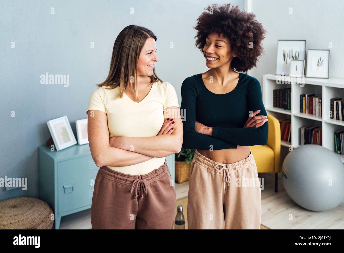 Arms crossed looking at each other hi-res stock photography and images ...