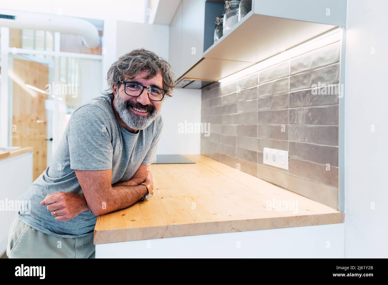 Man leaning on counter High Resolution Stock Photography and Images - Alamy