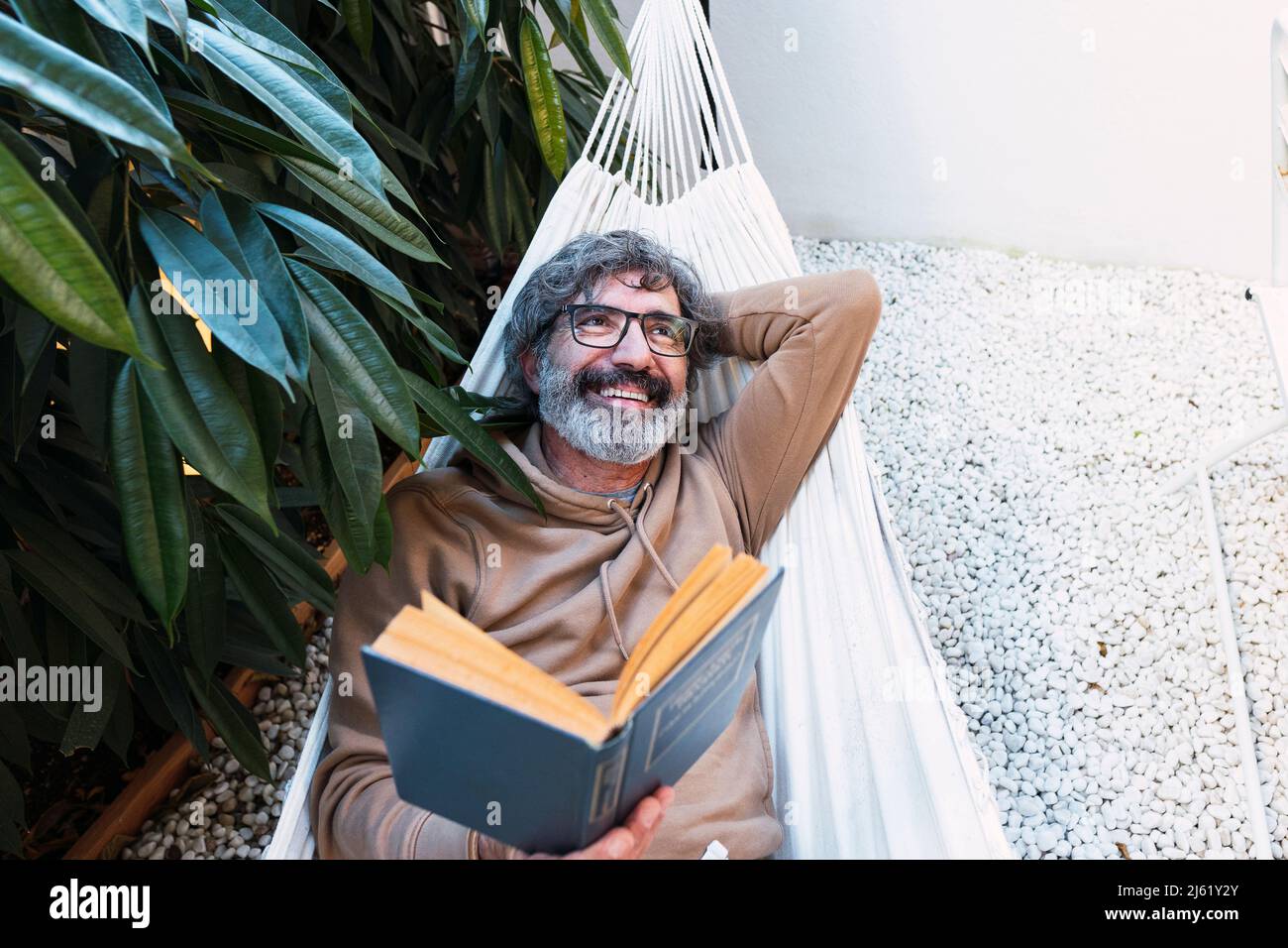Happy man and the book hi-res stock photography and images - Alamy