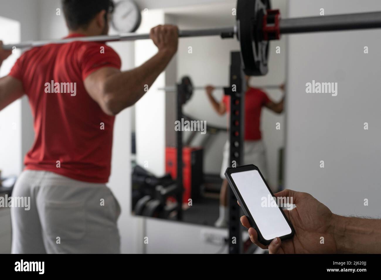 Lifting smartphone hi-res stock photography and images - Alamy