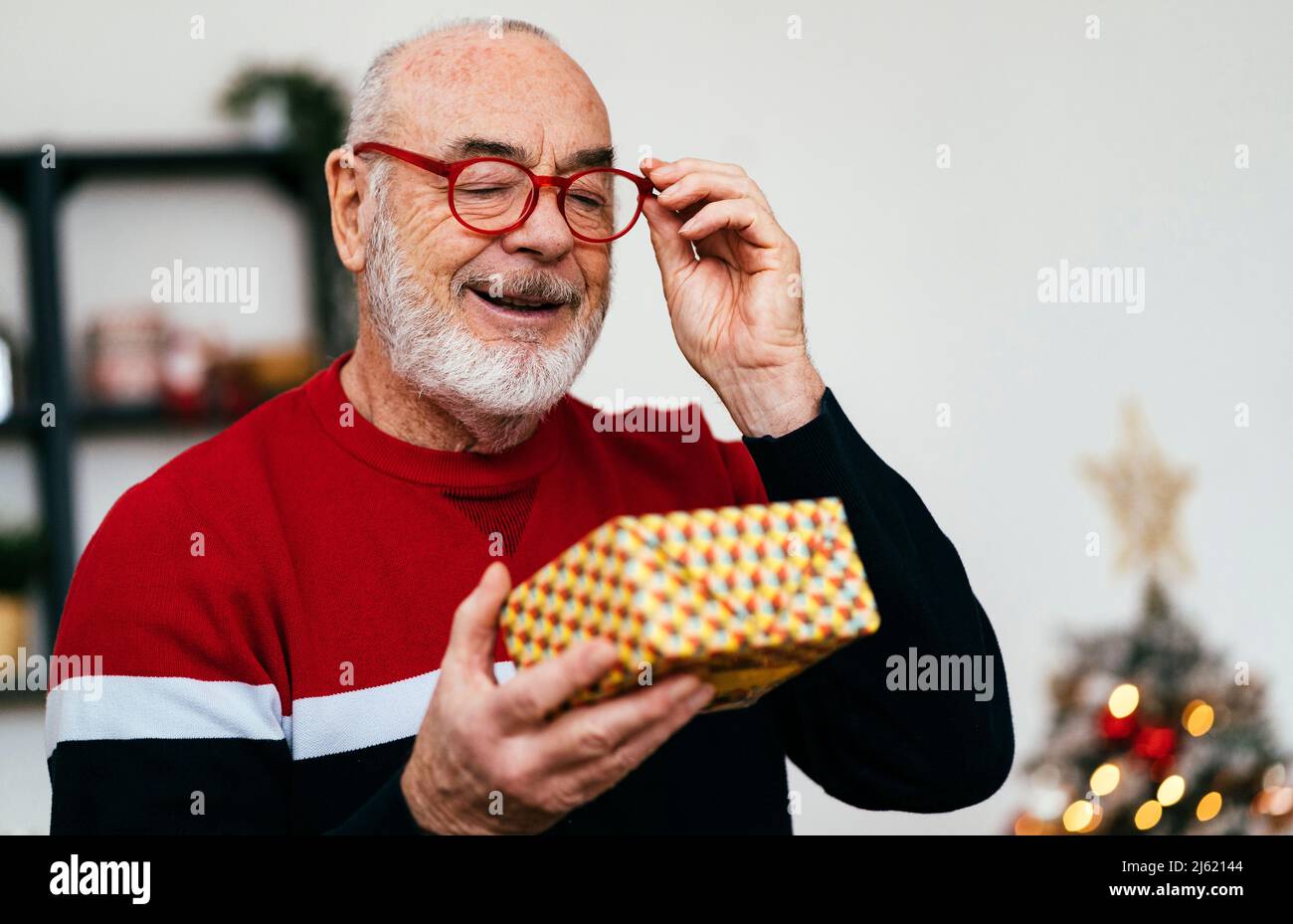 Looking at gift box hi-res stock photography and images - Alamy