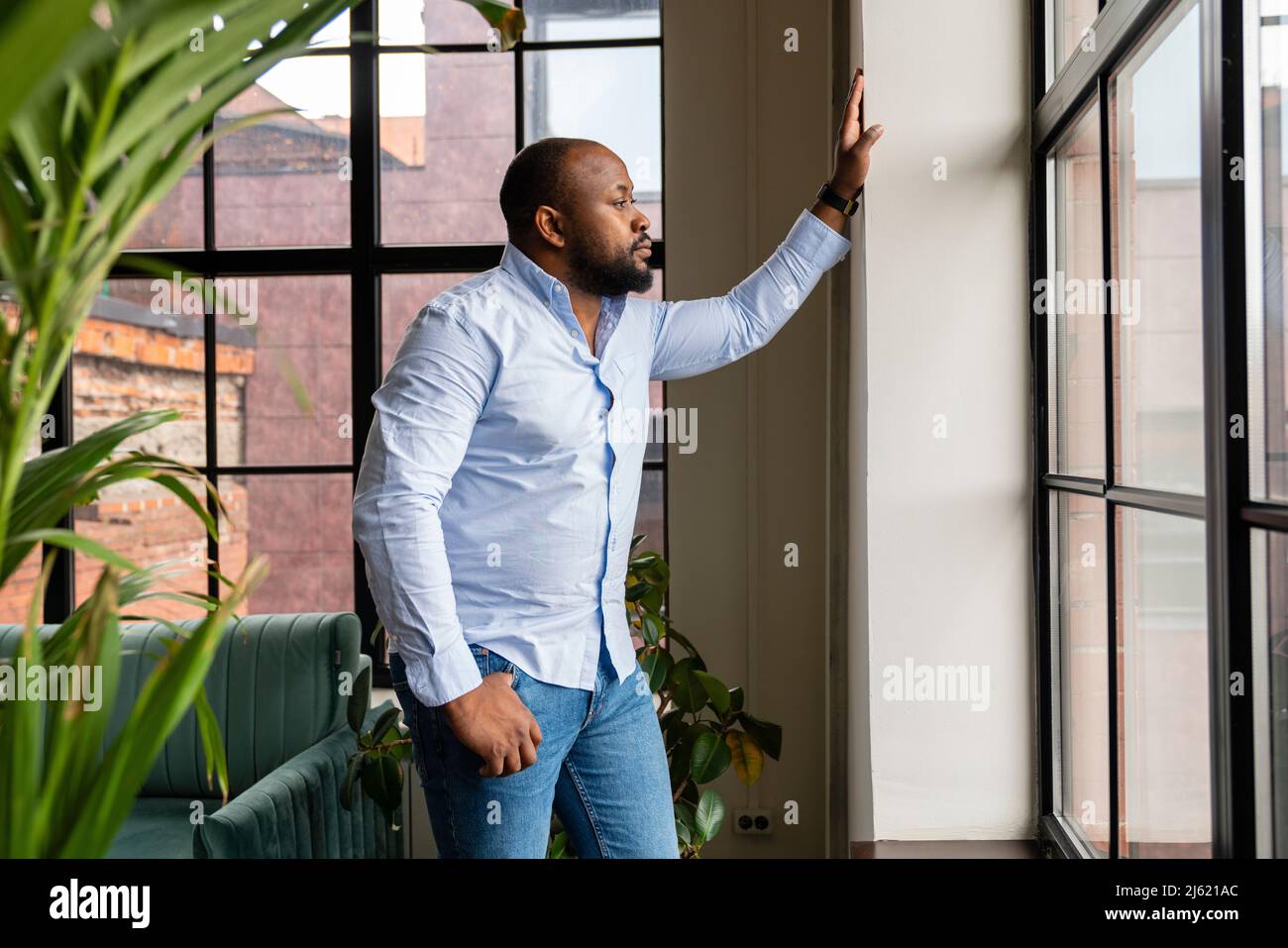 Corporate looking out window hi-res stock photography and images - Alamy