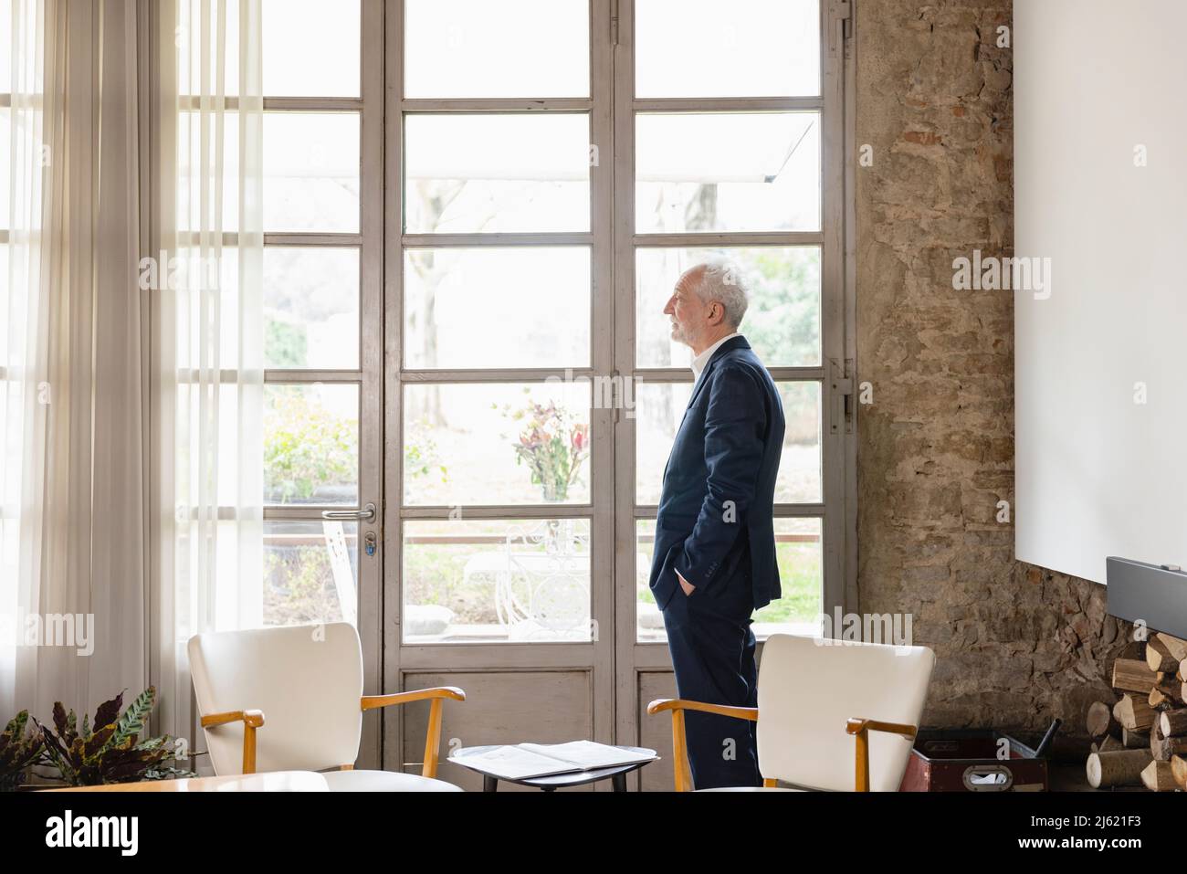 Looking through widow hi-res stock photography and images - Alamy