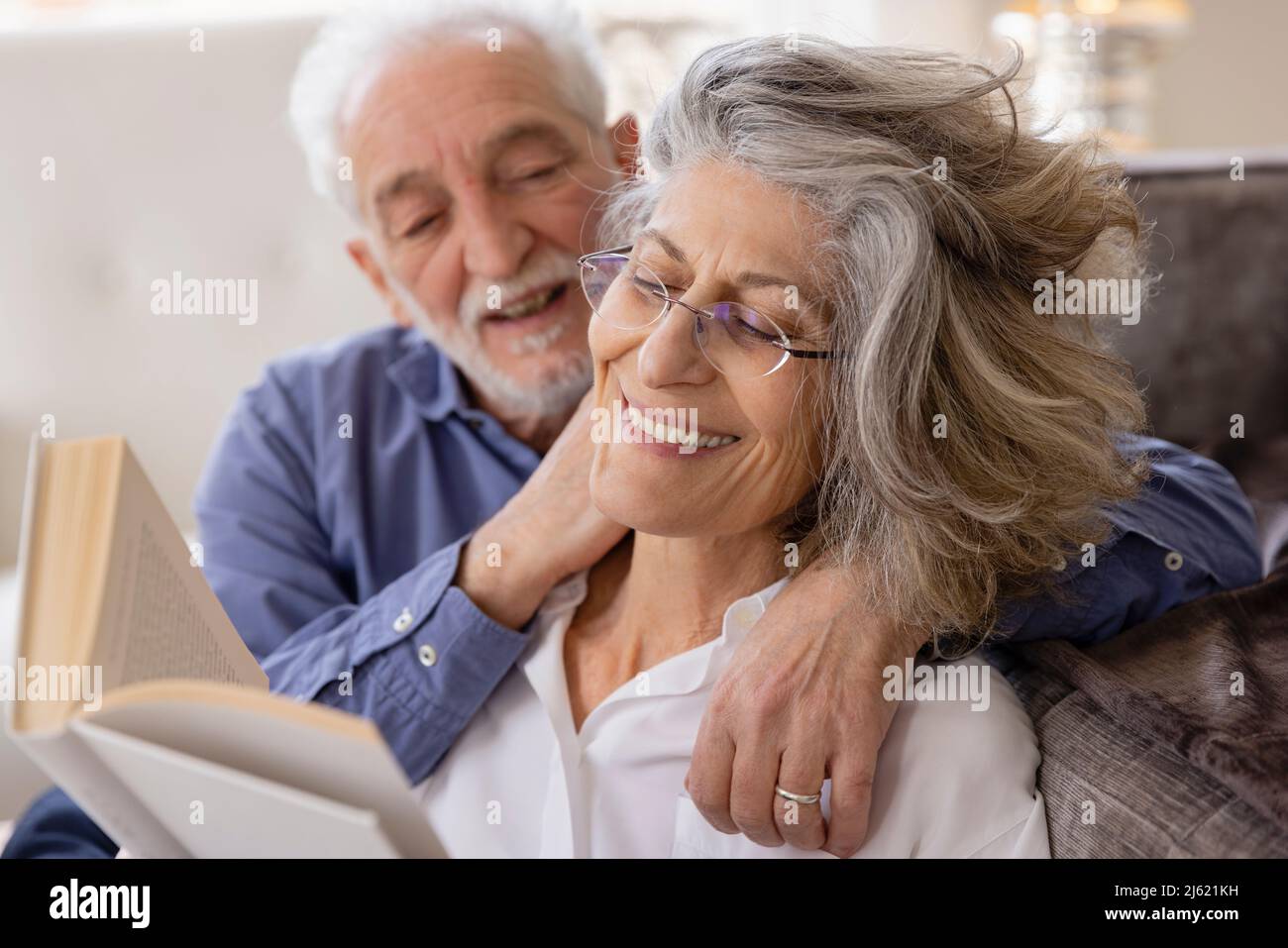 Man embracing book hi-res stock photography and images - Alamy