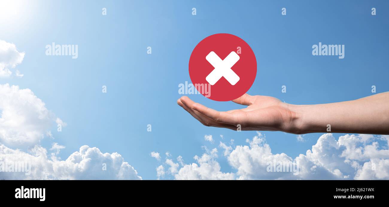 Hand holds icon,cancellation symbol,cancel icon.Cross mark flat red ...