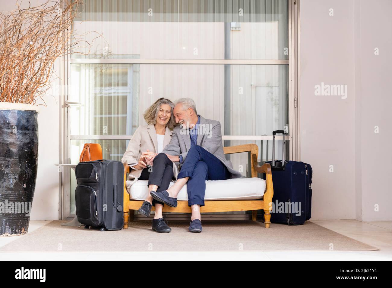 Senior bench luggage hi-res stock photography and images - Alamy