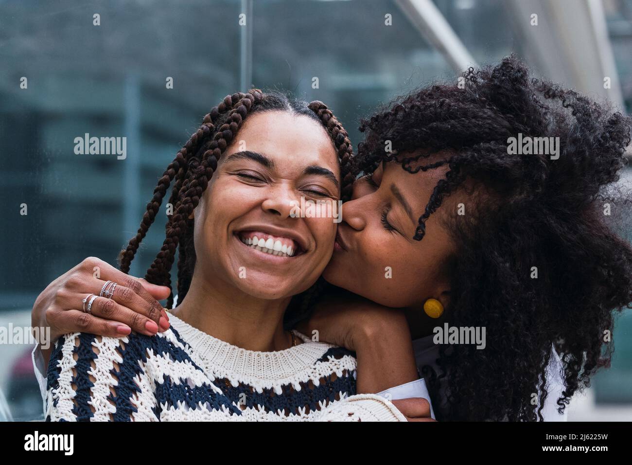 Kissing cheek office hi-res stock photography and images - Alamy