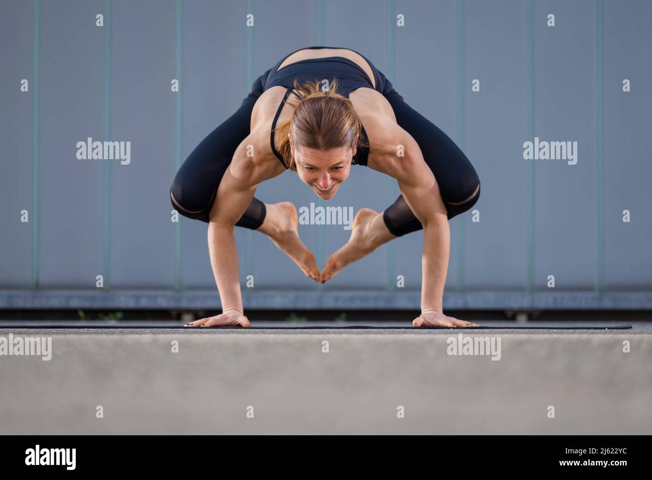 Balancing on hands hi-res stock photography and images - Alamy