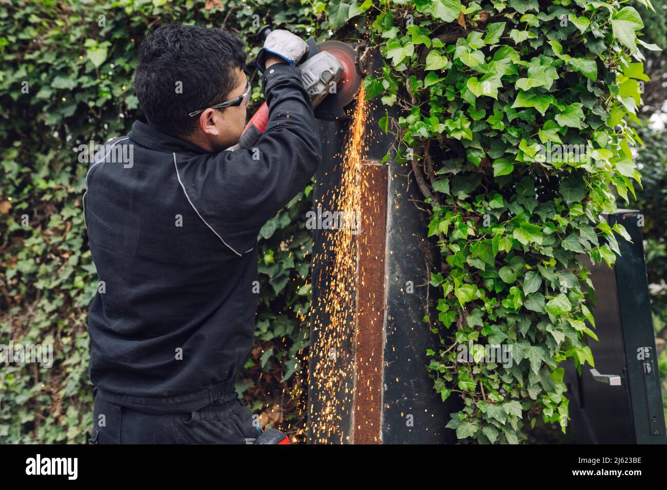 Man using grinding machine hi-res stock photography and images - Alamy
