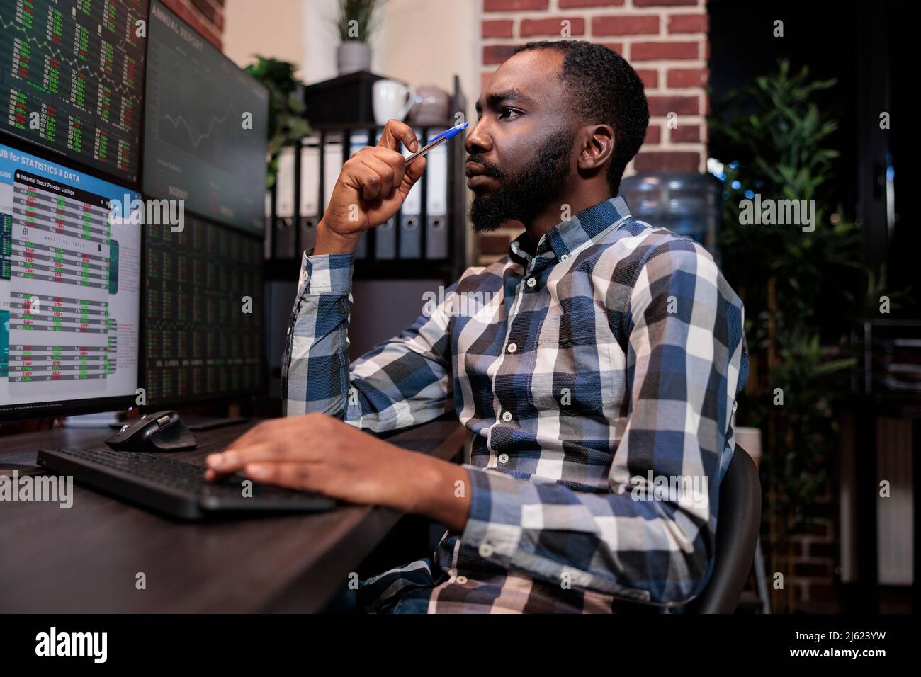 Brokerage company employee concentrated on forex stock market trend ...