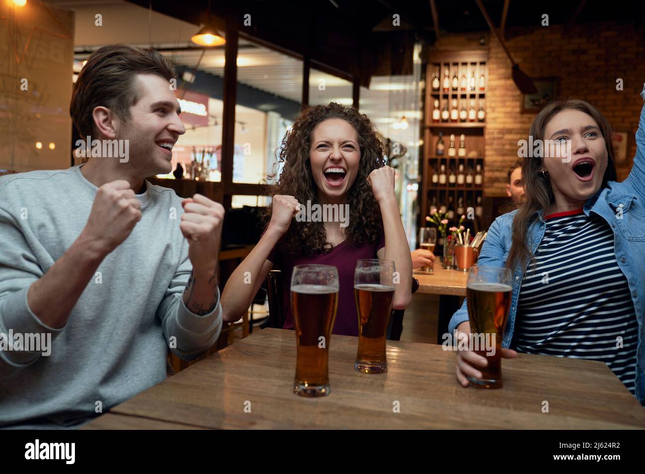 Female football fans drinking hi-res stock photography and images - Alamy
