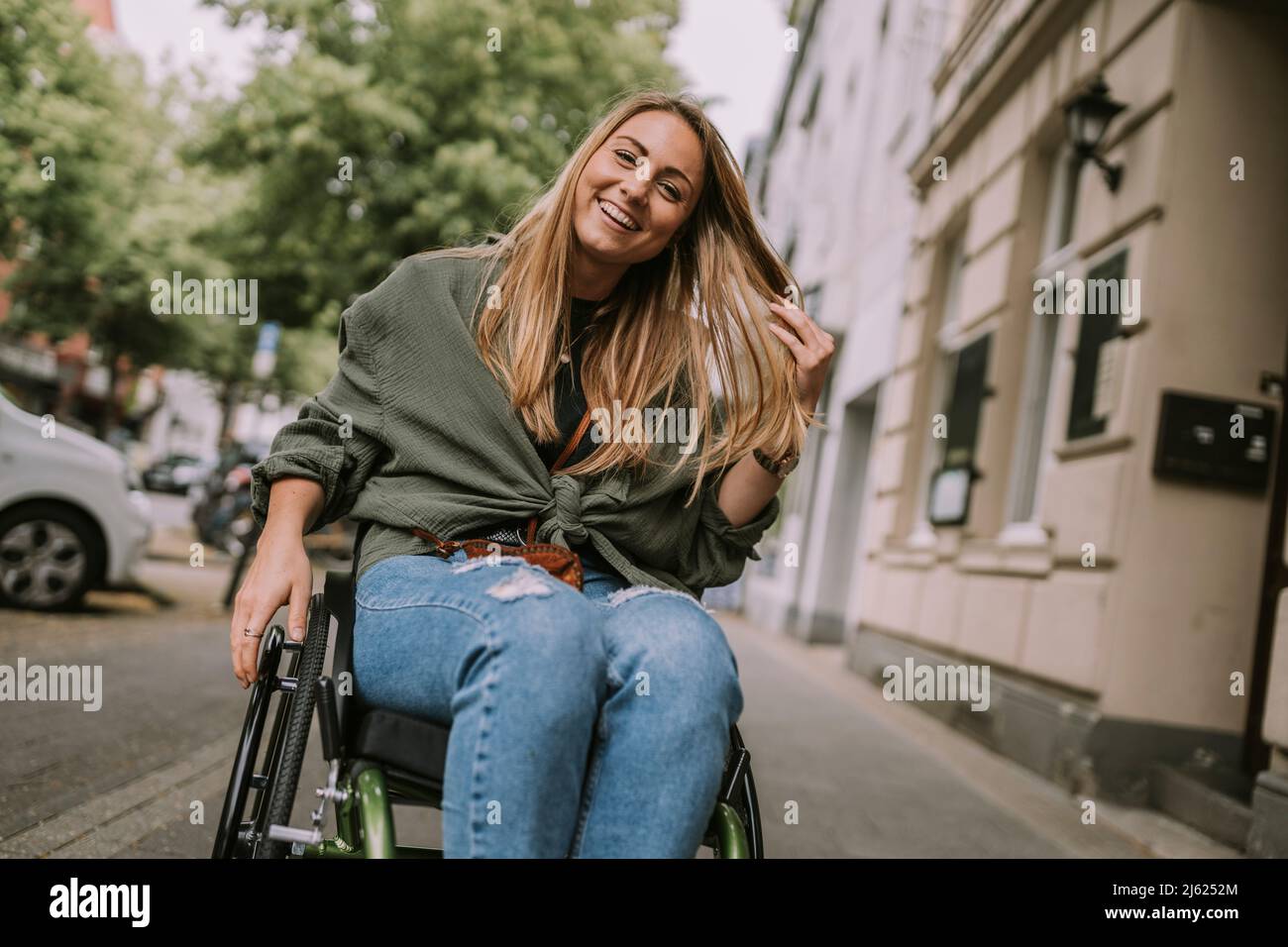 Pavement wheelchair hi-res stock photography and images - Alamy