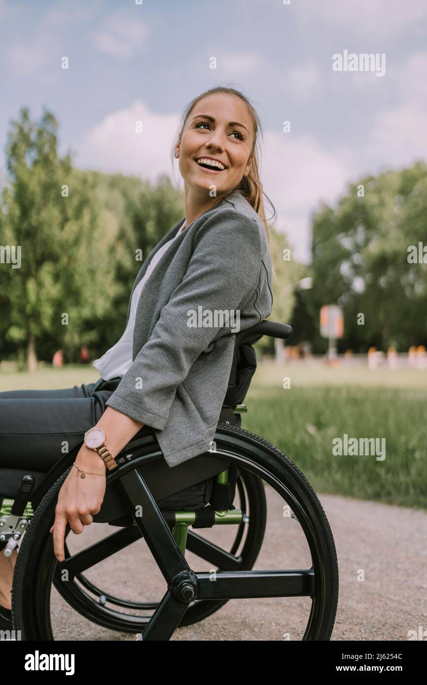 Disabled young woman in wheelchair hi-res stock photography and images ...