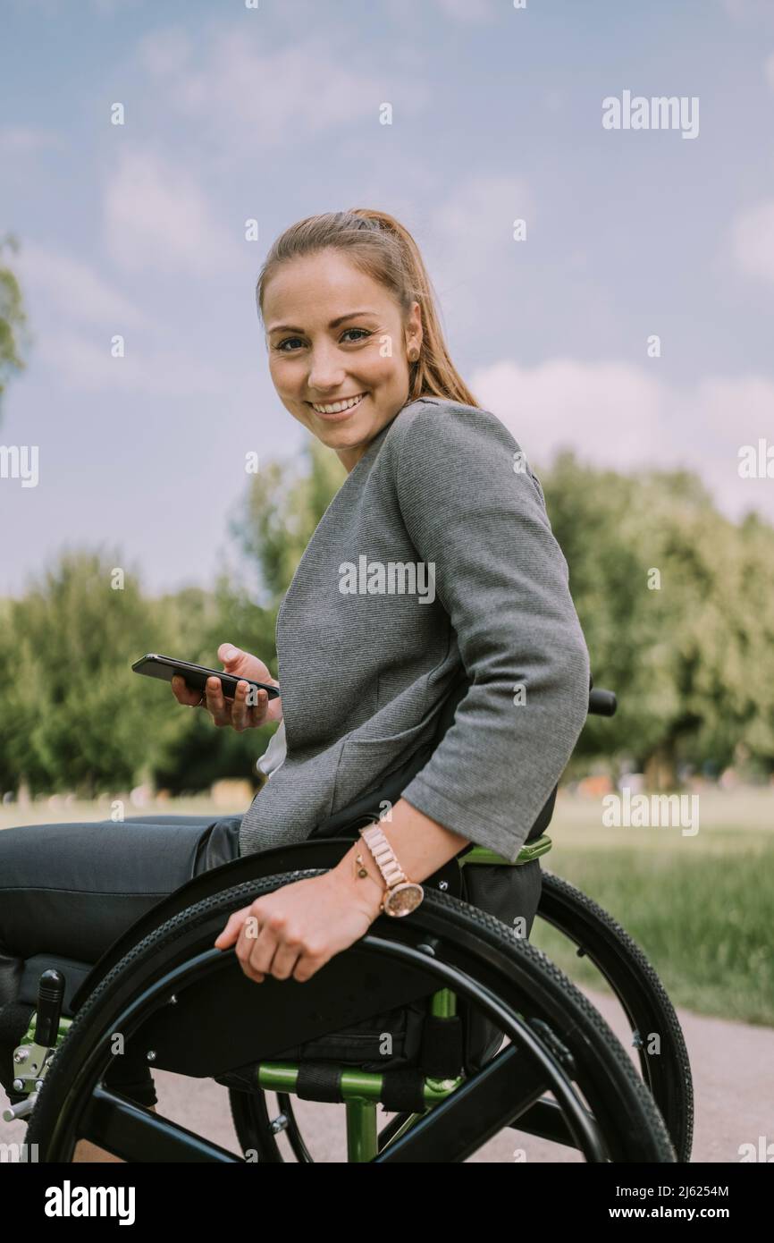 Smiling wheelchair hi-res stock photography and images - Alamy