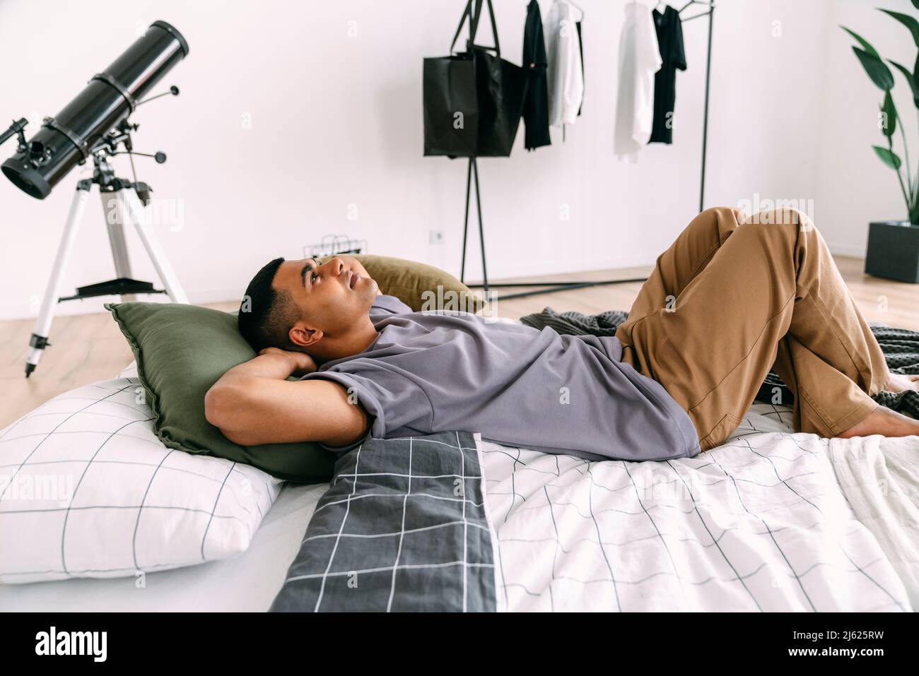 Man hands behind back side view hi-res stock photography and images - Alamy