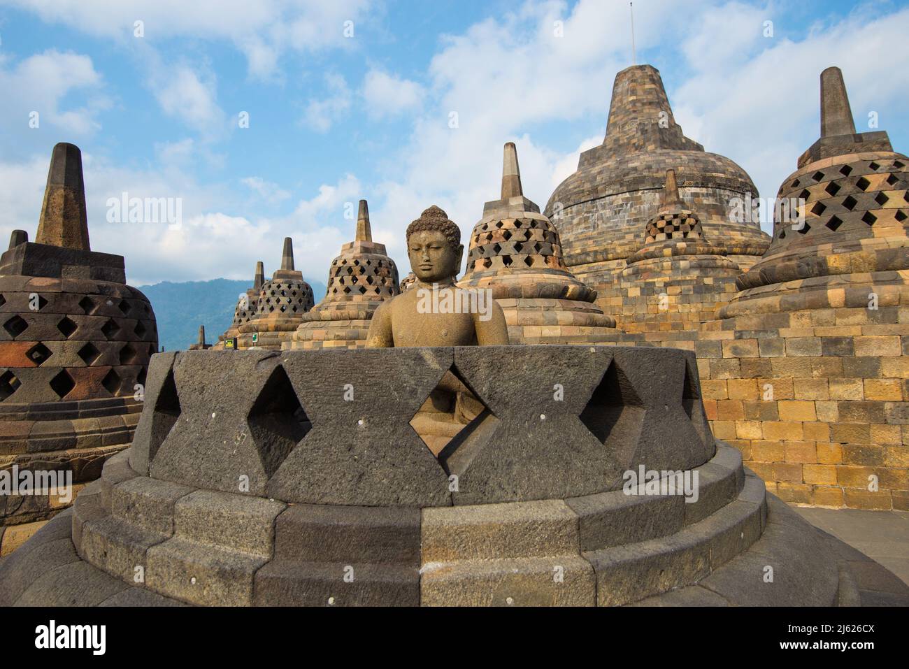 Buddha statue at buddhist temple Borobudur, Java, Indonesia Stock Photo ...