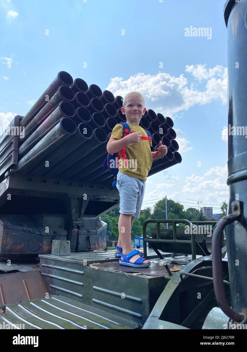 A child stands in front of a rocket launcher, Ukraine Stock Photo - Alamy