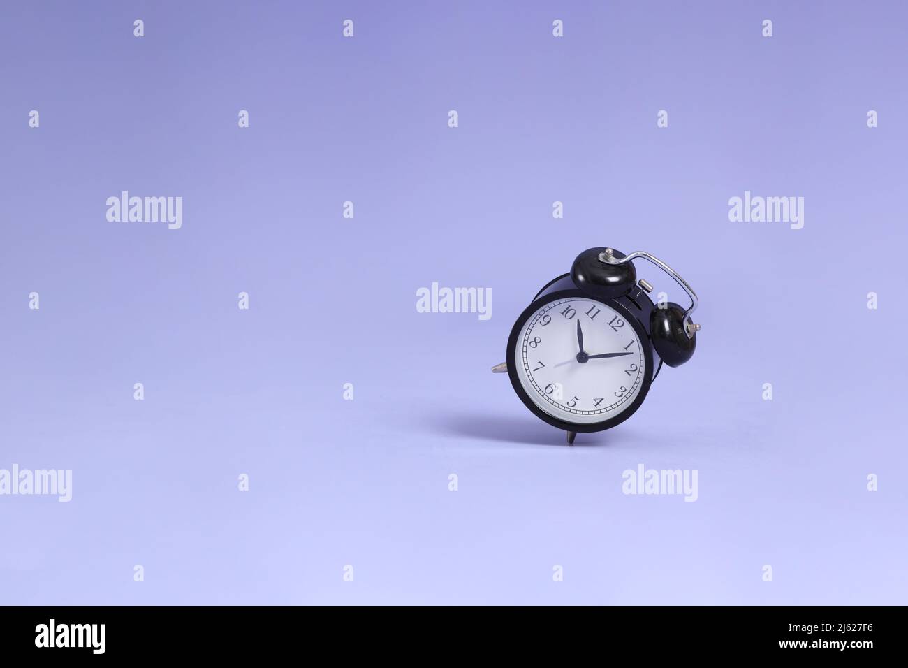 The isolated picture of clock floating on the purple background Stock ...
