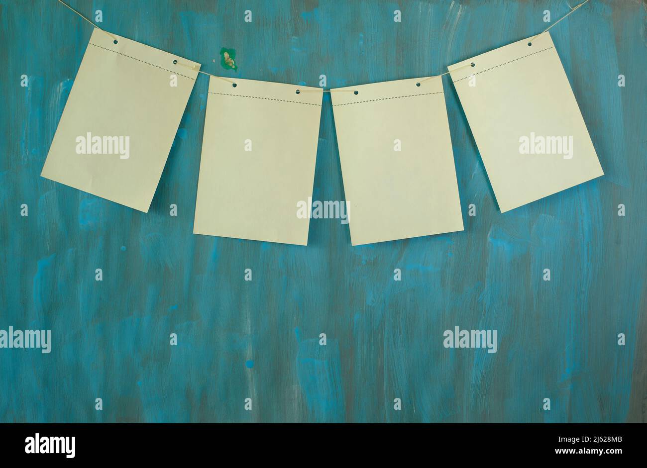 empty notes hanging on grungy background,message,anouncement ...