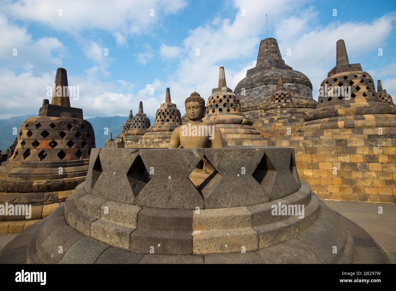 Buddha statue at buddhist temple Borobudur, Java, Indonesia Stock Photo ...