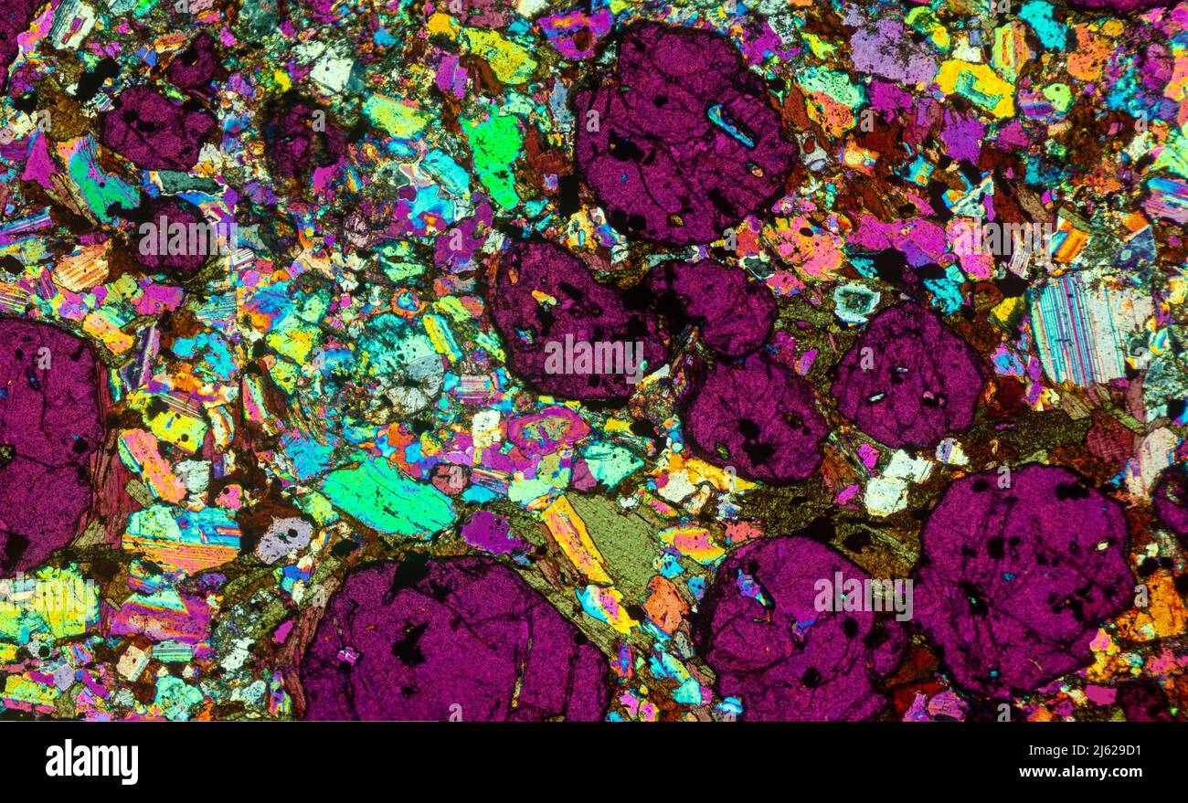 Garnet from Saxony in polarised light and quarter wave plate Stock ...